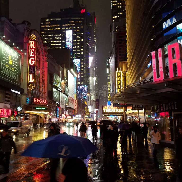 Rain in Times Square editorial stock photo. Image of infrastructure ...