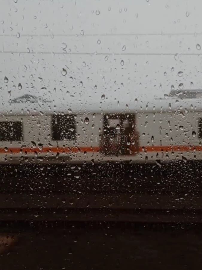 Rain in the Train Windows Clouds Traveller Indonesia Stock Photo - Image of windows, indonesia ...