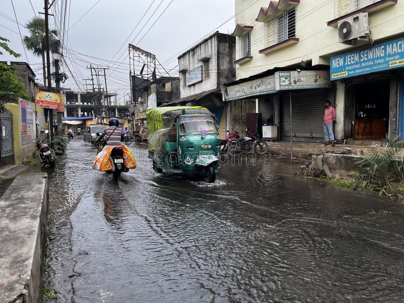 Rain Water Accumulated on the Broken Road. Editorial Stock Image ...