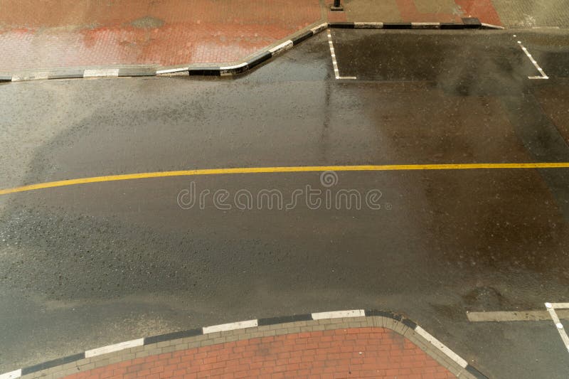 Rain Water on the City Road and Sidewalk Stock Image - Image of ...