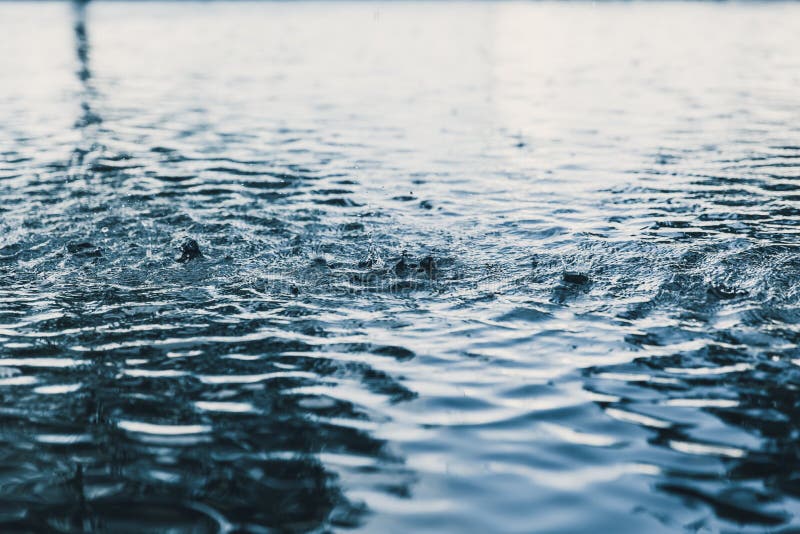 Rain water drop raining stock photo. Image of pond, blue - 104005134