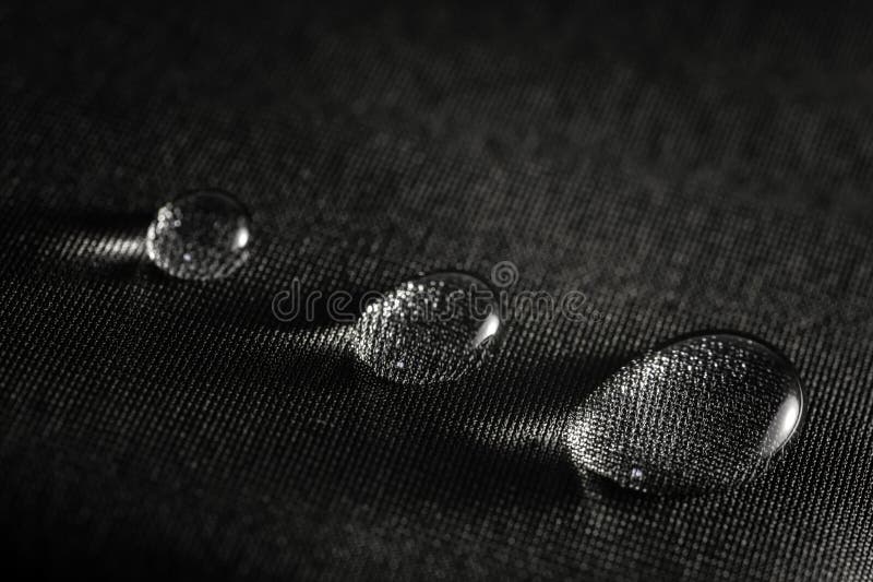 Rain Water Droplets on Black Fiber Waterproof Fabric Stock Photo ...