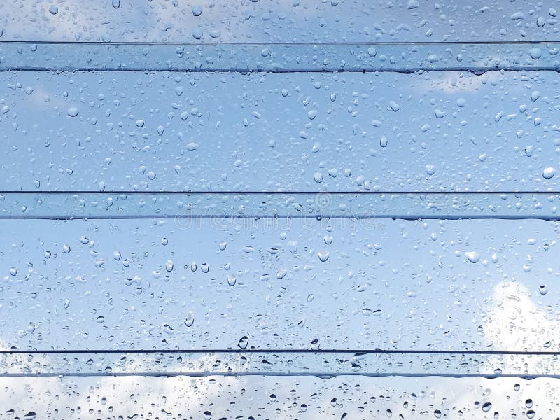 Rain Water Drops on Glass with Tropical Blue Sky Background with Clouds ...