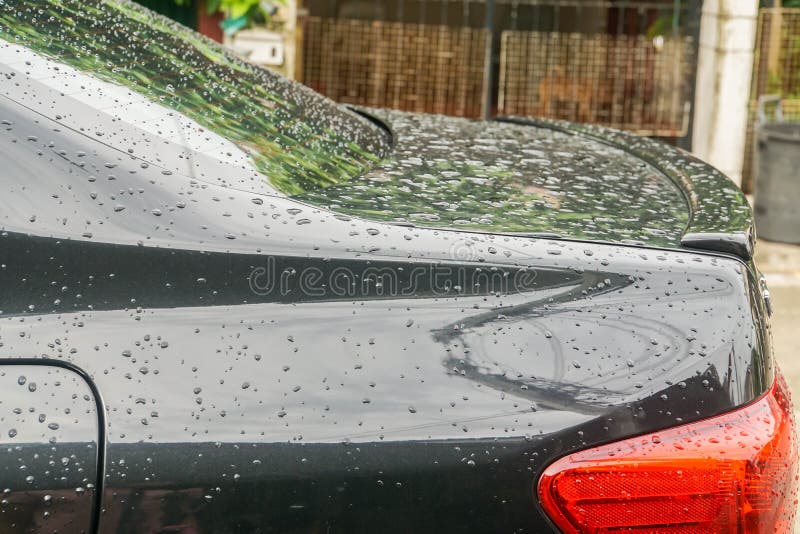 Rain Water Drops on Rear Black Car Stock Photo - Image of back ...