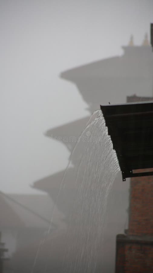 Rain Water Falling From Old Roof When Rain Falling. Stock Photo - Image ...