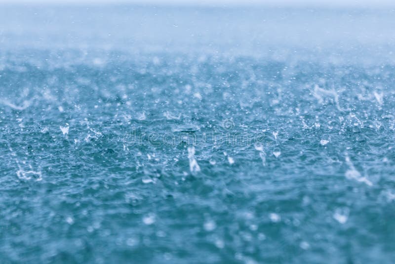 Rain on Sea stock image. Image of wave, storm, rain, sunlight - 31756067