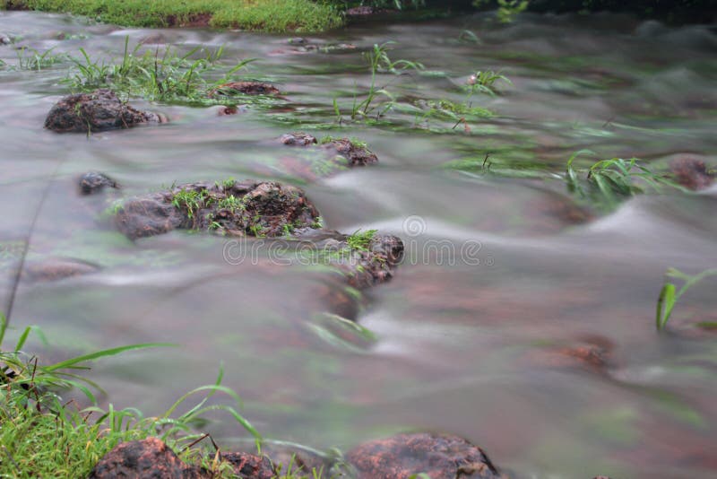 Rain water stream stock photo. Image of flowing, background - 96140950