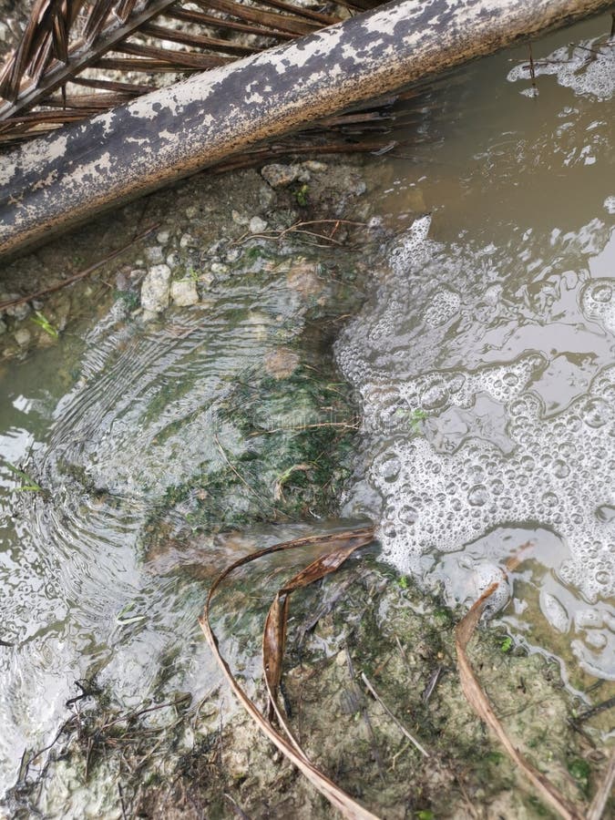 Rain Water Streaming Along the Drainage River. Stock Photo - Image of ...