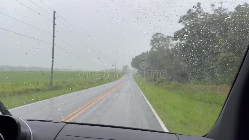 Rain on the Windshield of a Vehicle while Driving Stock Video - Video ...