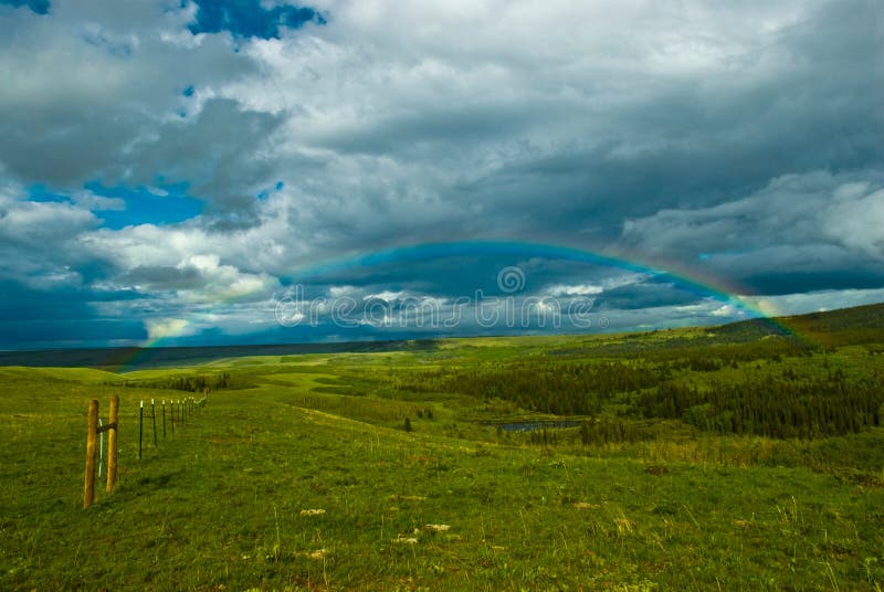 Arctic rainbow in Svalbard stock image. Image of outdoors - 16759017