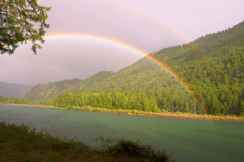 Rainbow Above River Picture. Image: 6038995