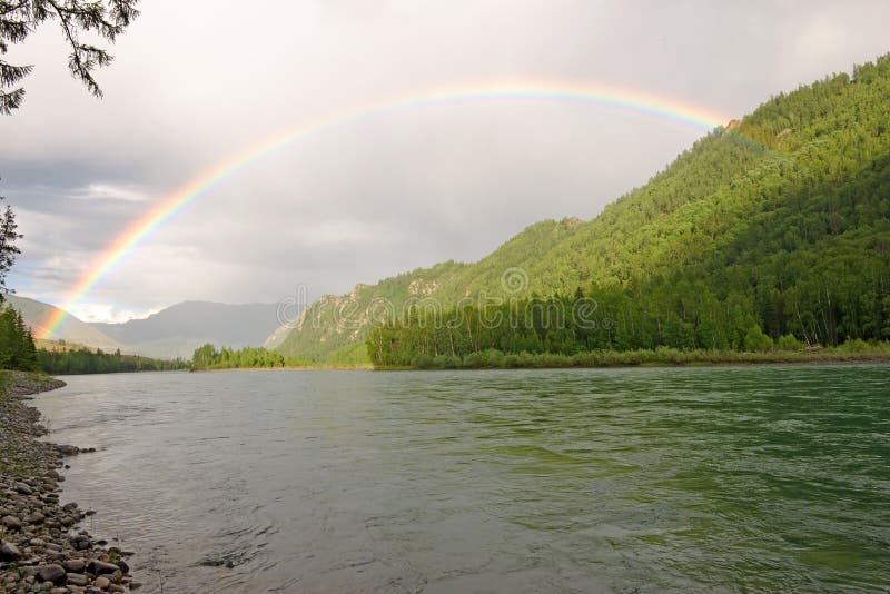 Rainbow above river stock photo. Image of nature, stone - 6225208