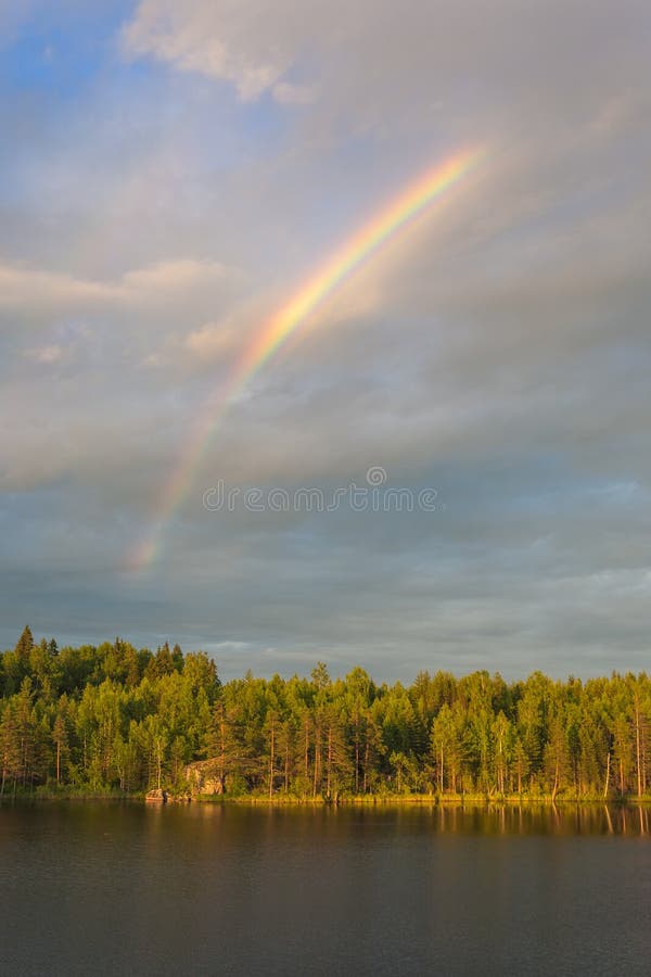 Rainbow from the Deck, Lake of the Woods, Kenora, Ontario Stock Photo ...