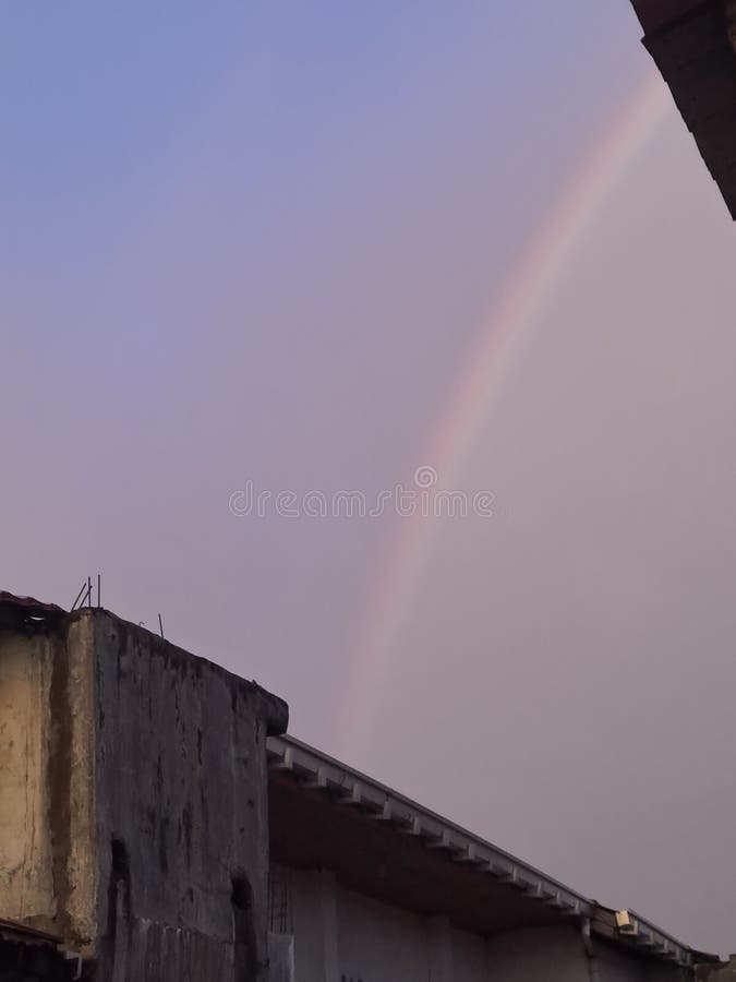 A Rainbow Appearing in the Night Sky Stock Image - Image of morning ...