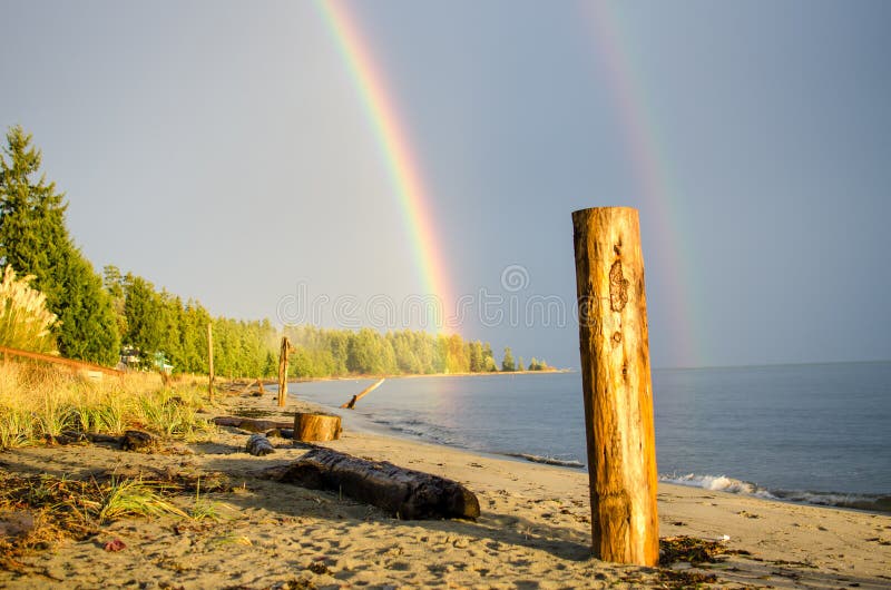 Rainbow on the beach stock photo. Image of weather, beauty - 47226338