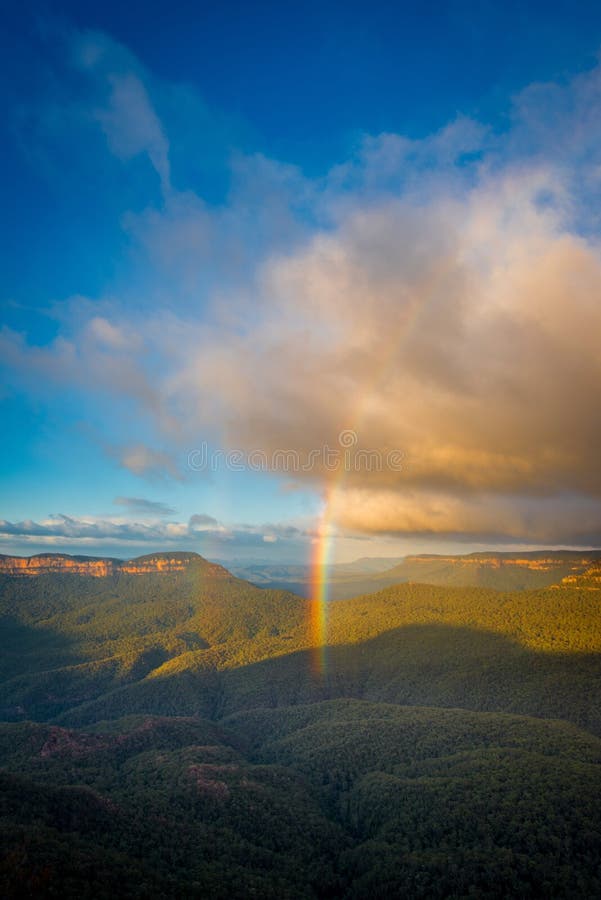 Rainbow in Blue Mountains stock photo. Image of environment - 74968968