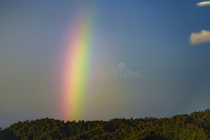 Rainbow with Blue Sky and Mountain Range Stock Photo - Image of ...