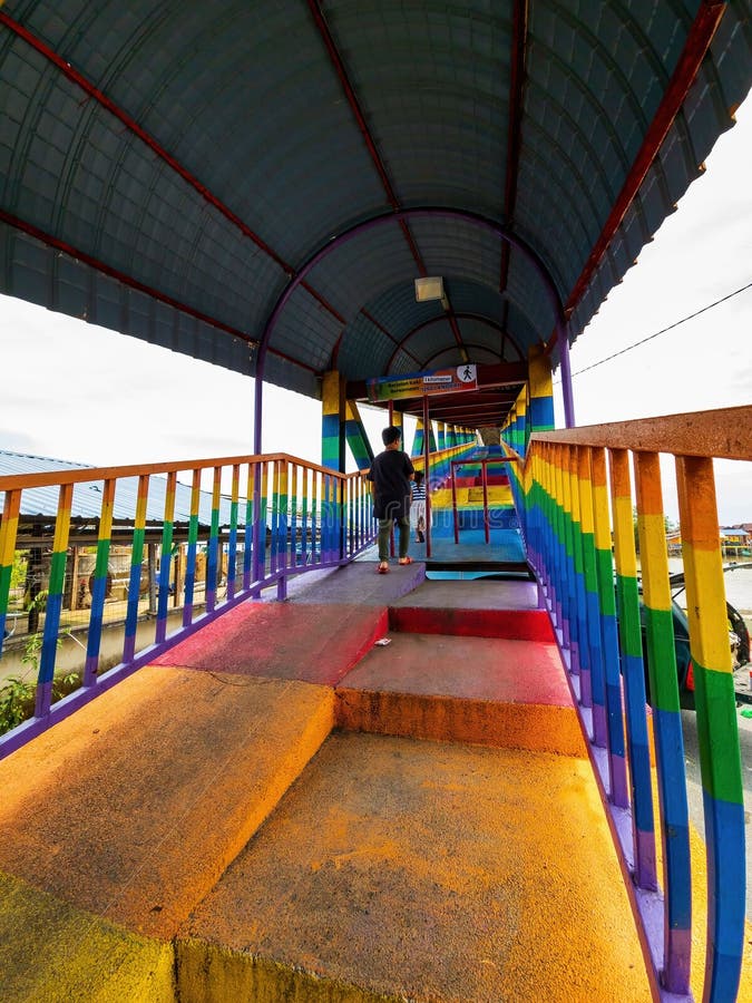 Rainbow Bridge in Kuala Perlis. Stock Photo - Image of colorful, clouds ...