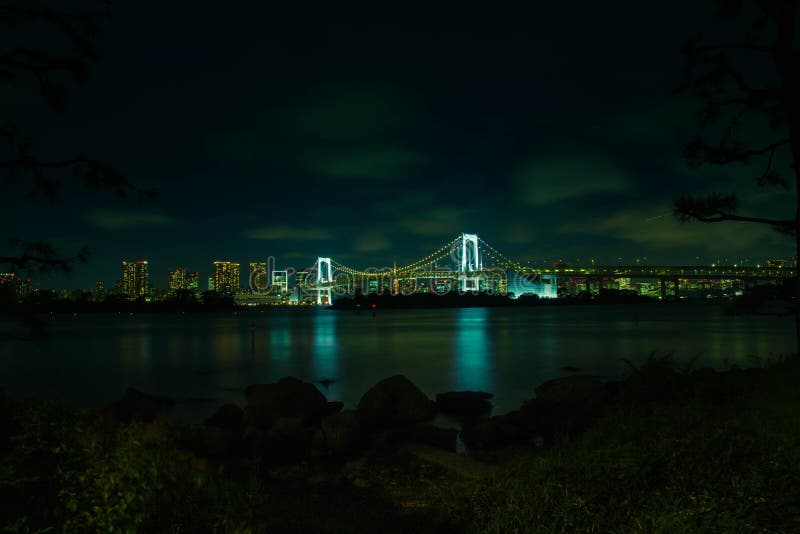 Rainbow Bridge at Night View Stock Photo - Image of bridge, night ...