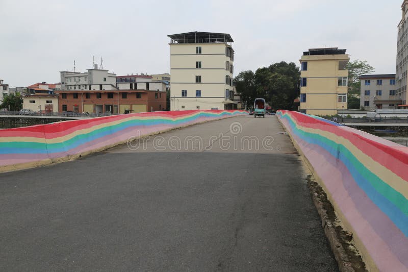 A Rainbow Bridge with a Rainbow Painted on it Stock Image - Image of ...