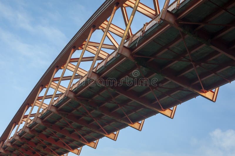 Detail of a Red Metal Bridge Against a Lovely Blue Sky. Stock Image ...