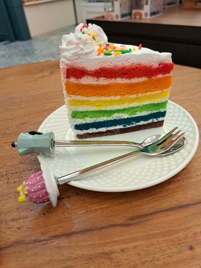 Rainbow cake color stock photo. Image of baking, sweetness - 375694456