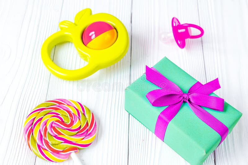 Rainbow Candy and Gift Box on Wooden Background Stock Photo - Image of ...