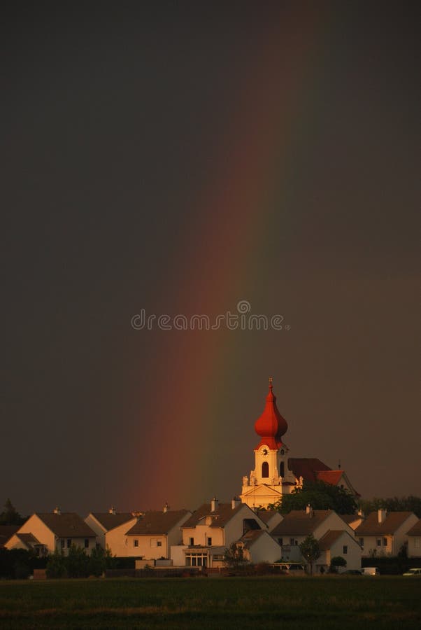 Rainbow church portrait stock image. Image of landscape - 28979275