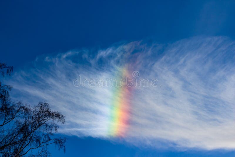 A Rainbow Cloud Against a Blue Sky, a Rare Optical Phenomenon in the ...
