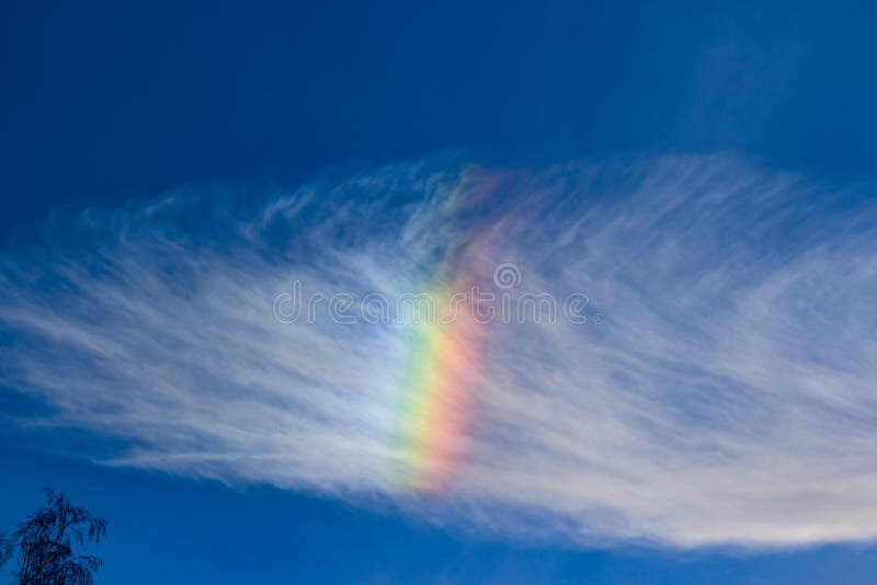 A Rainbow Cloud Against a Blue Sky, a Rare Optical Phenomenon in the ...
