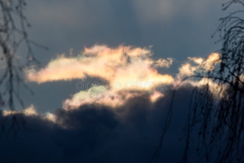 Rainbow Clouds on the Edge of a Large Cloud Stock Photo - Image of ...
