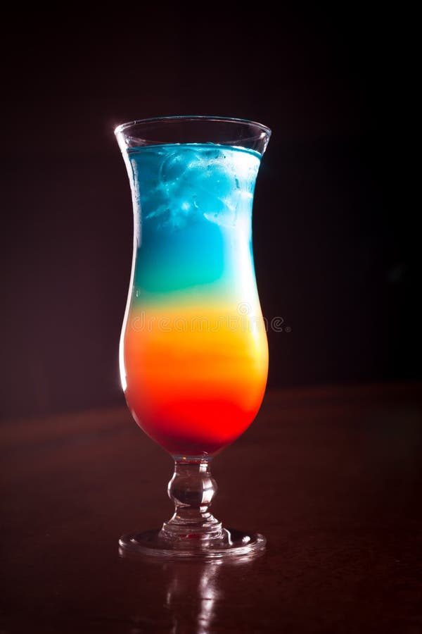 Rainbow cocktail stock image. Image of dark, black, food - 49707731