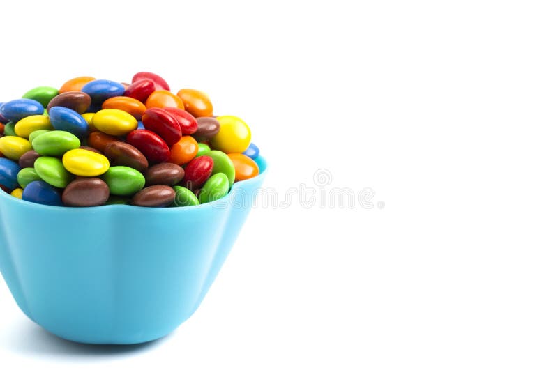 Rainbow Colored Candy Coated Chocolate Buttons in a Fun Blue Bowl ...