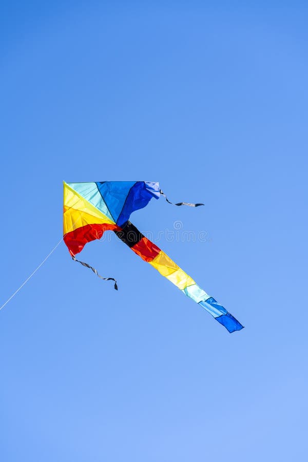 Rainbow colored kite stock image. Image of outside, colorful - 250742199