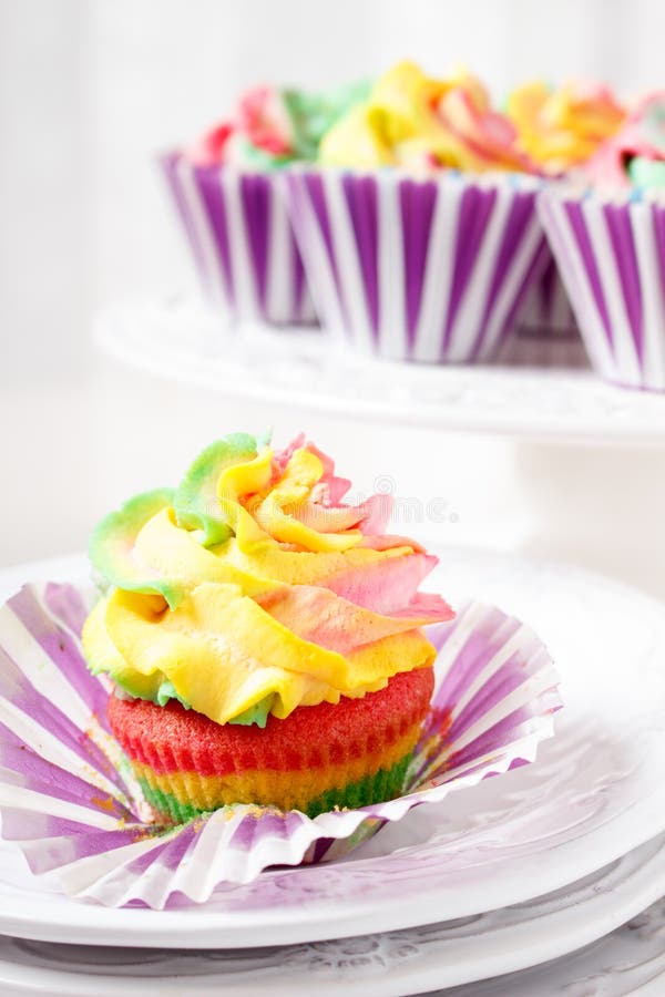 Rainbow colored muffins stock image. Image of bakery - 45488891