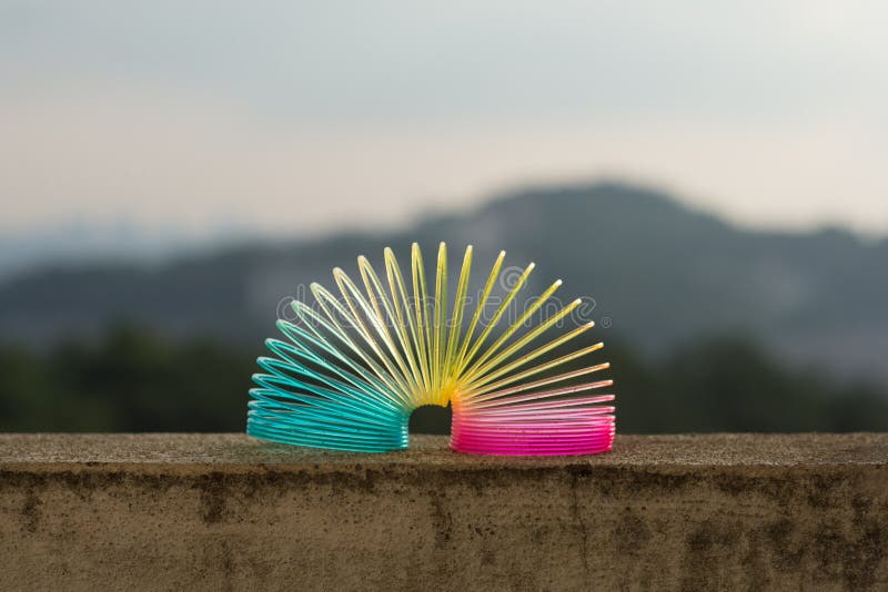 Rainbow Colored Wire Spiral Toy. Editorial Image - Image of circle ...