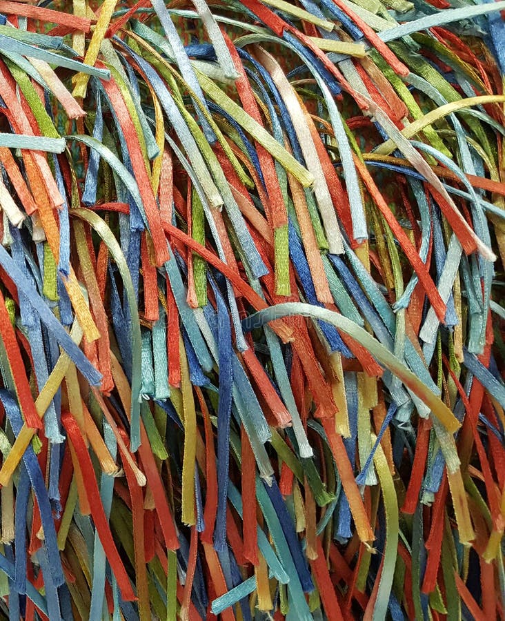 A Rainbow of Colorful Strands of Ribbons and Threads Stock Image ...