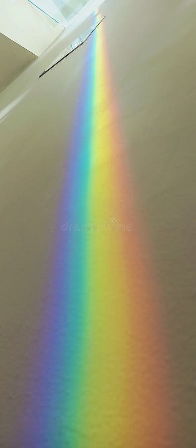 Rainbow Colors on the Wall Due To Light Reflecting Off the Glass Stock ...
