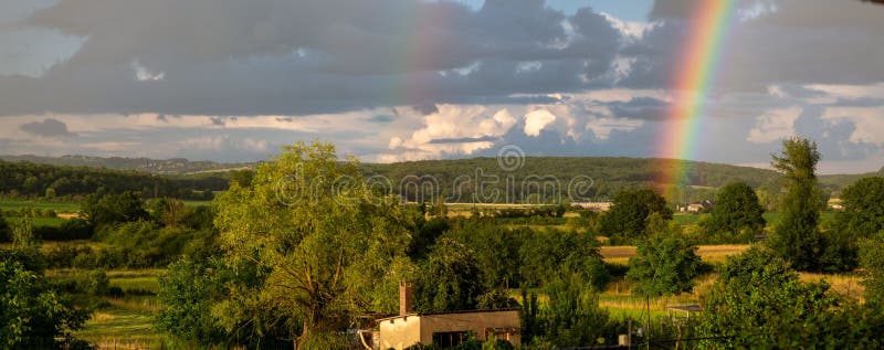 Rainbow on the Country Side. Stock Image - Image of building, side ...