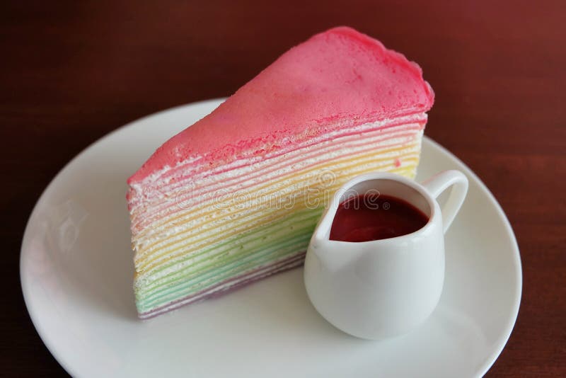 Rainbow Crape Cake with Strawberry Sauce. Stock Photo - Image of sauce ...