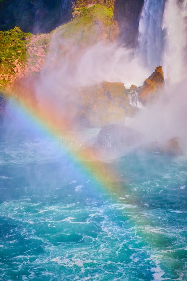 Rainbow Crossing through Niagara River with American Falls Behind in ...