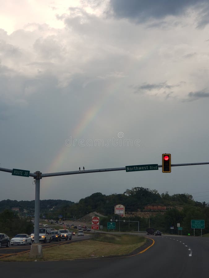 Rainbow while Driving in Traffic at a Red Stoplight Stock Image - Image ...
