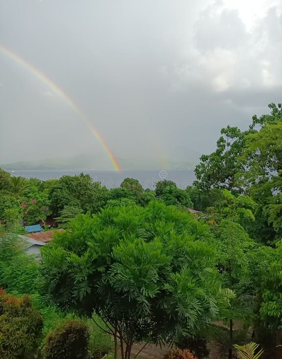 Rainbow at Dusk: a Promise in the Sky Stock Photo - Image of natural ...