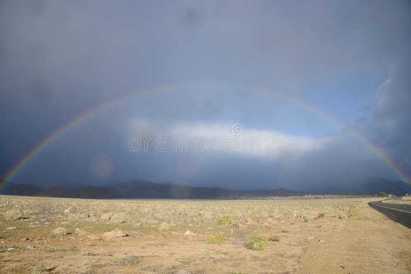 Rainbow stock image. Image of meadow, dark, flat, rain - 75937309