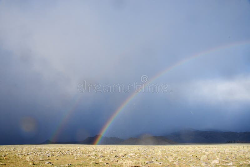 Rainbow stock image. Image of mountain, rainbow, landscape - 75937365