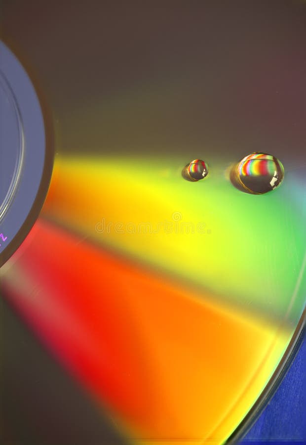 Rainbow Effect of Water and Light on a Compact Disc. Stock Image ...