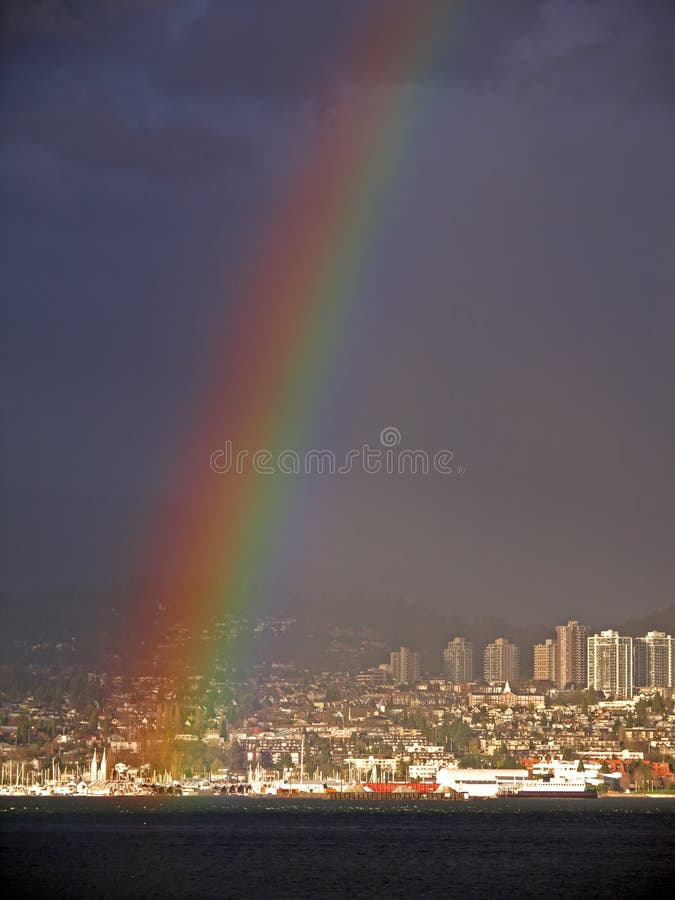 Rainbow Falling in Front of North Vancouver Stock Image - Image of ...