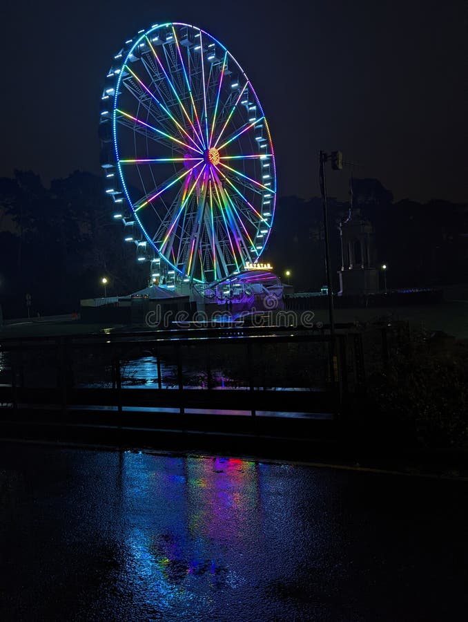 Rainbow Ferris Wheel on a Rainy Night in San Francisco Stock Photo ...