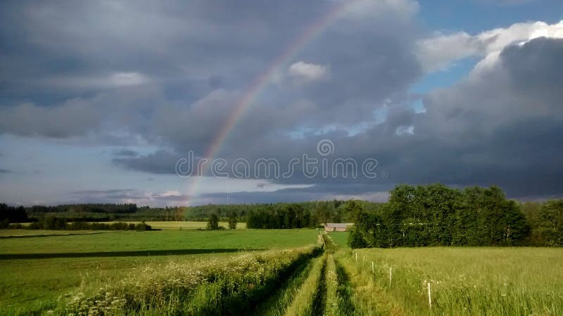Rainbow stock photo. Image of rainbow, field, landscape - 122884784