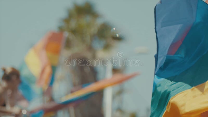 The Rainbow Flag Waving during a Pride Parade Stock Footage - Video of ...